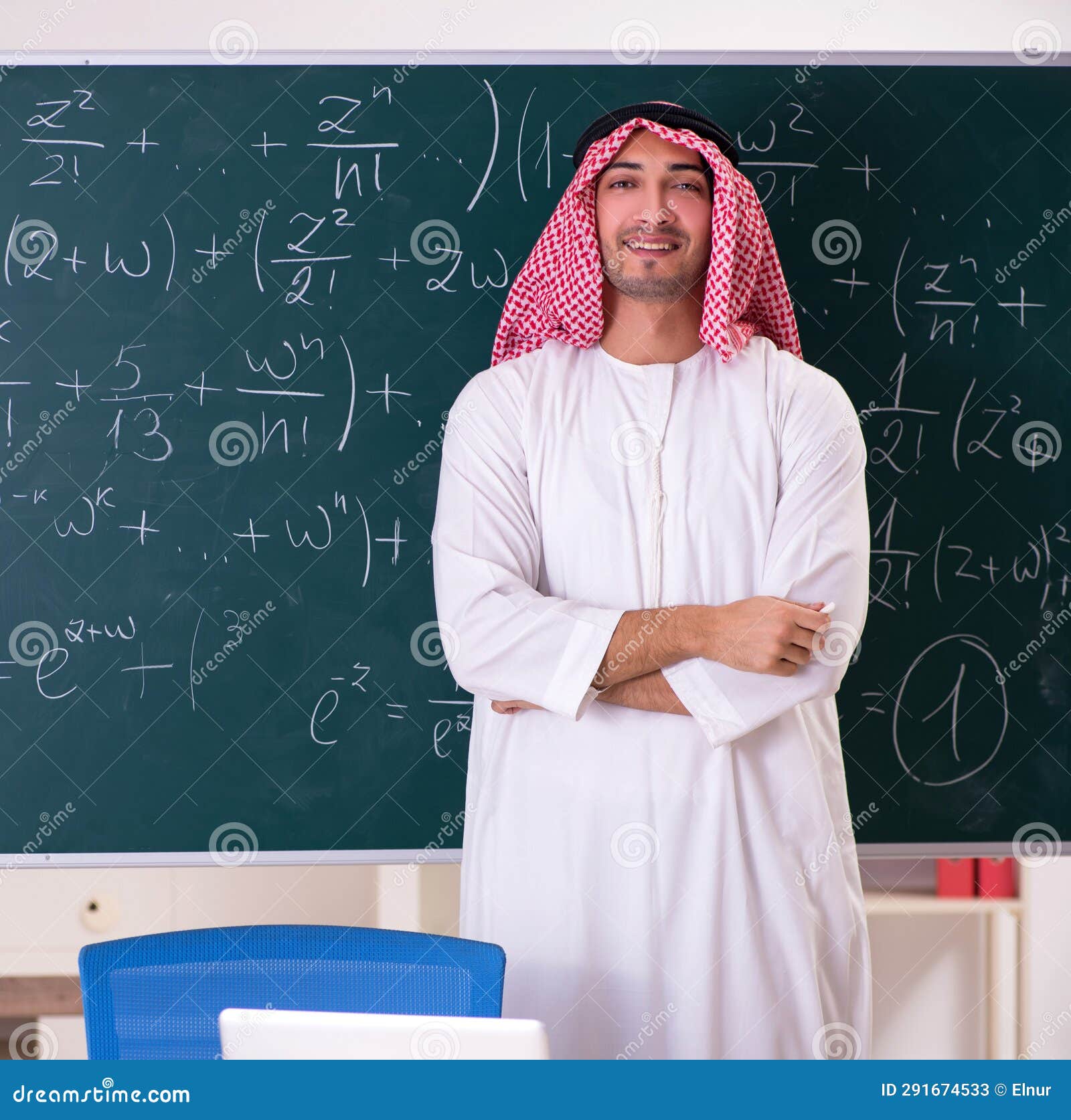 Arab Teacher in Front of Chalkboard Stock Image - Image of explaining ...