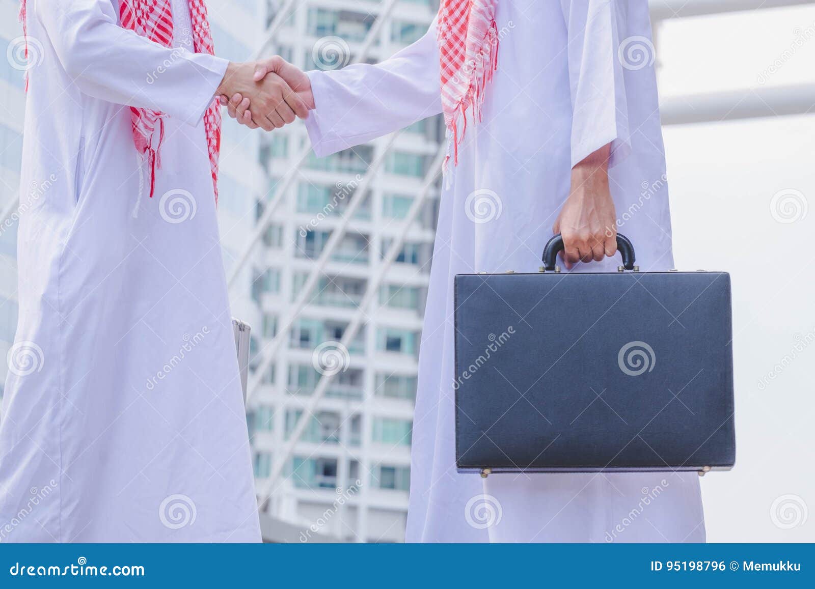 Arabian business handshake stock photo. Image of develop - 95198796