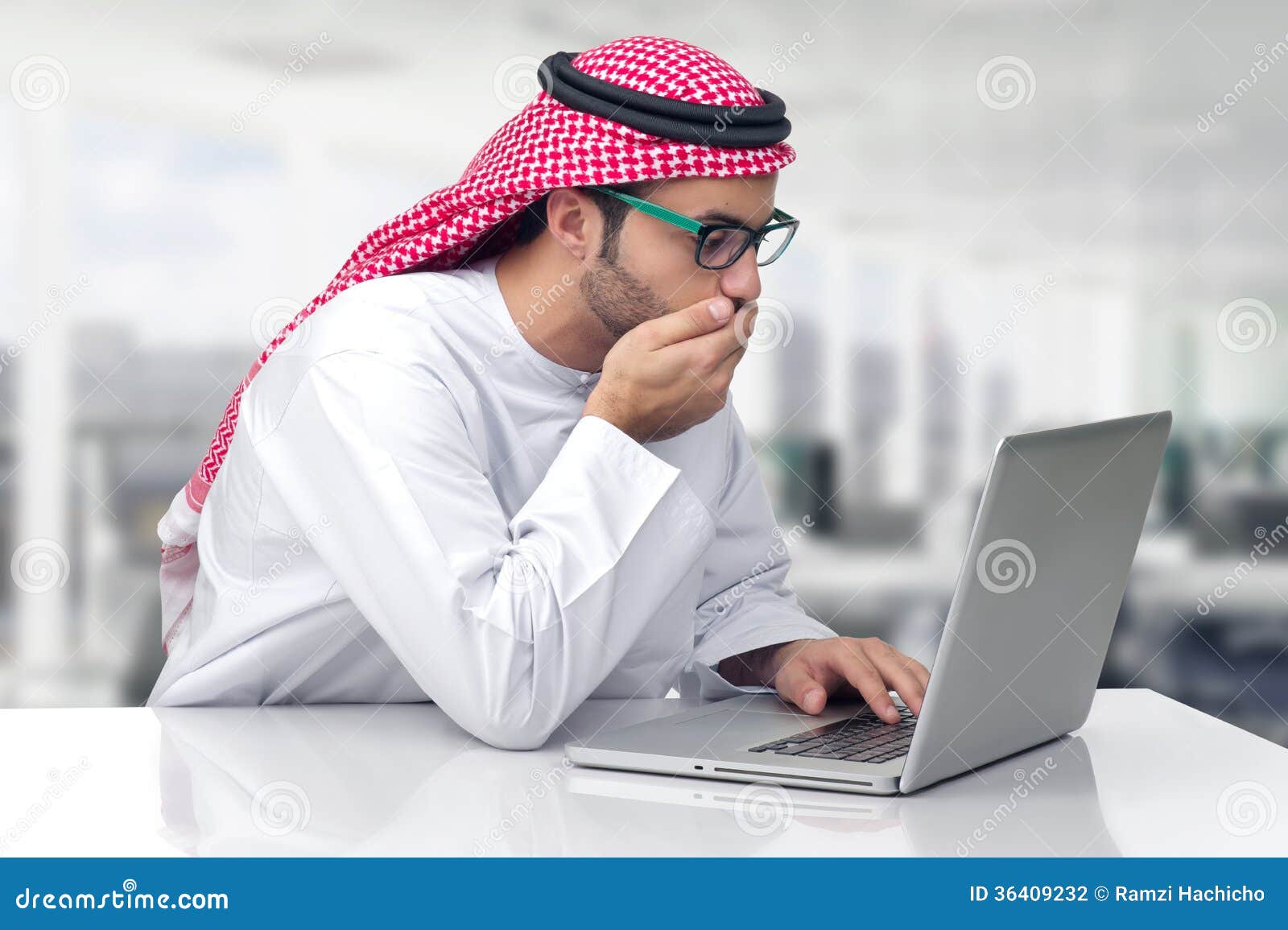 Arabian Business Man Looking Shocked at His Computer Stock Photo ...