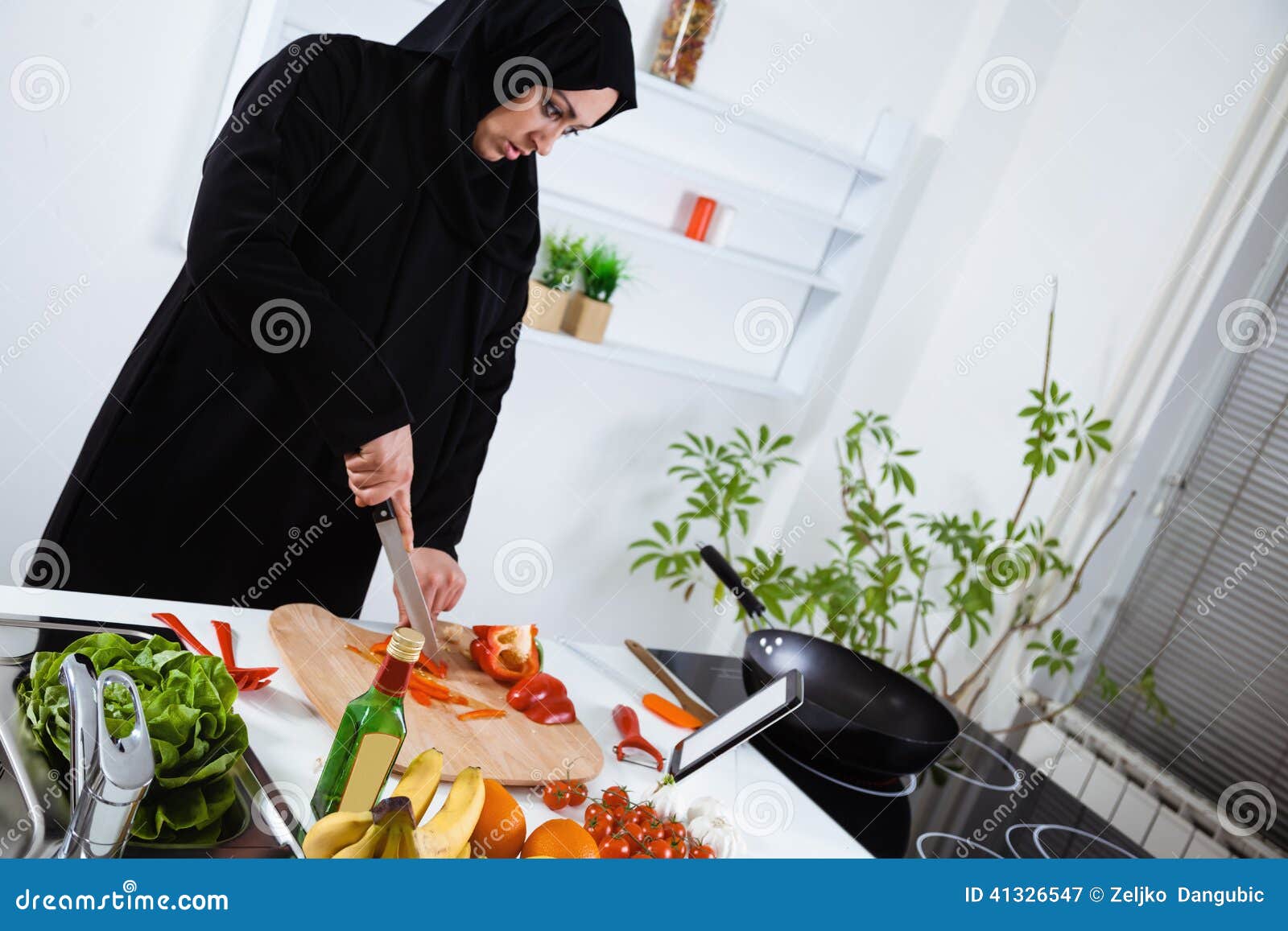 Arabian Woman Cooking in the Kitchen Stock Image - Image of cook, dubai ...