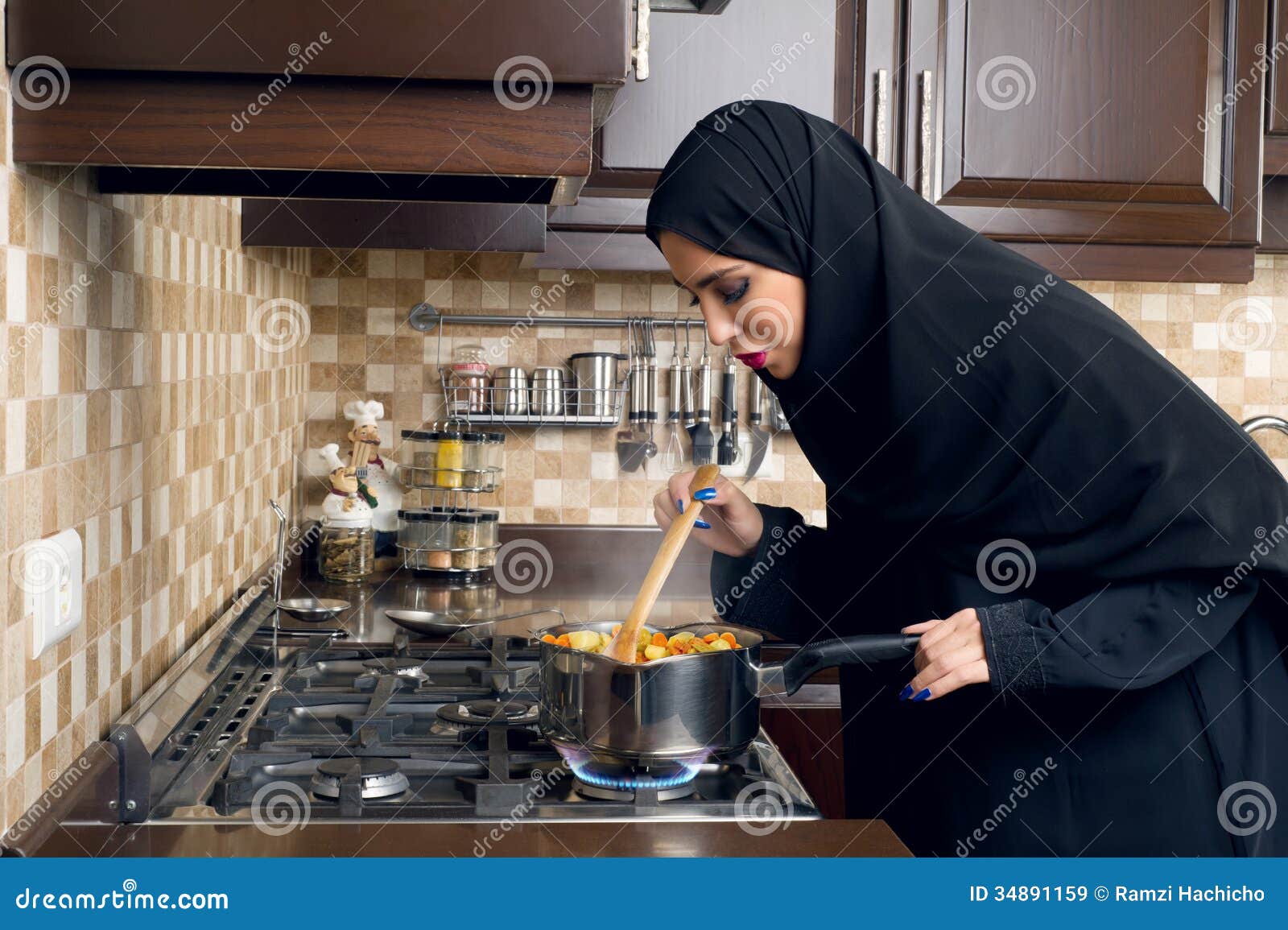 Arabian Woman Cooking Stew in the Kitchen Stock Image - Image of eating ...