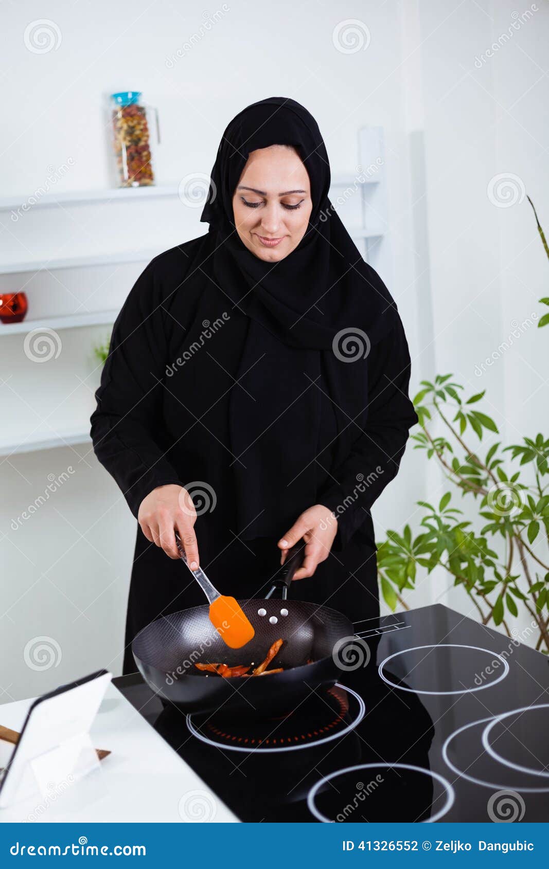 Arabian Woman in the Kitchen Stock Photo - Image of interior, cheerful ...
