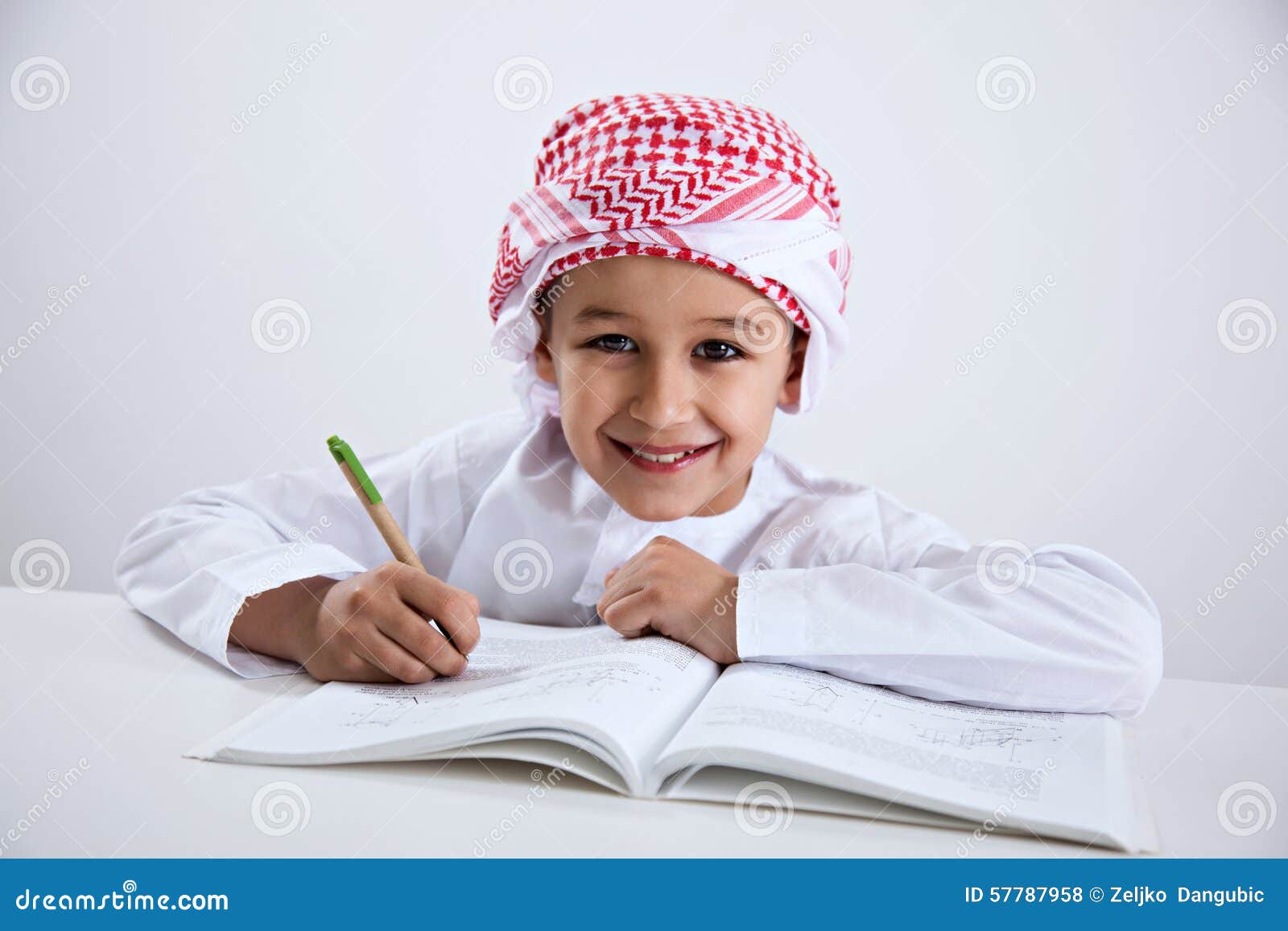 Arabic Boy Doing Homework stock photo. Image of arabic - 57787958