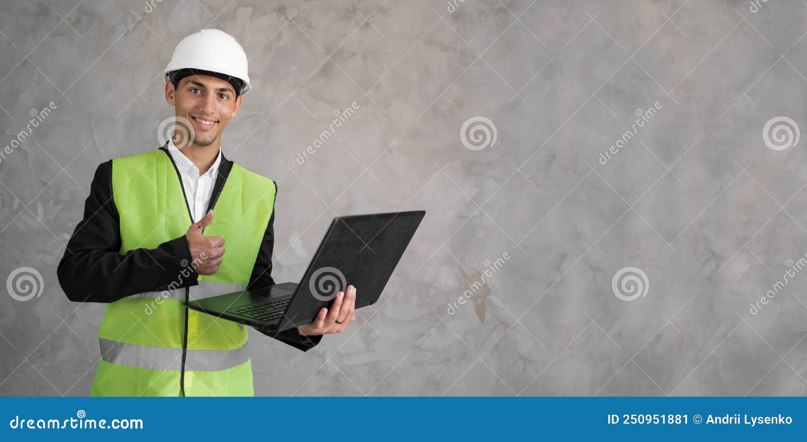 Arabic Civil Engineer Using Laptop. Engineering and Construction ...