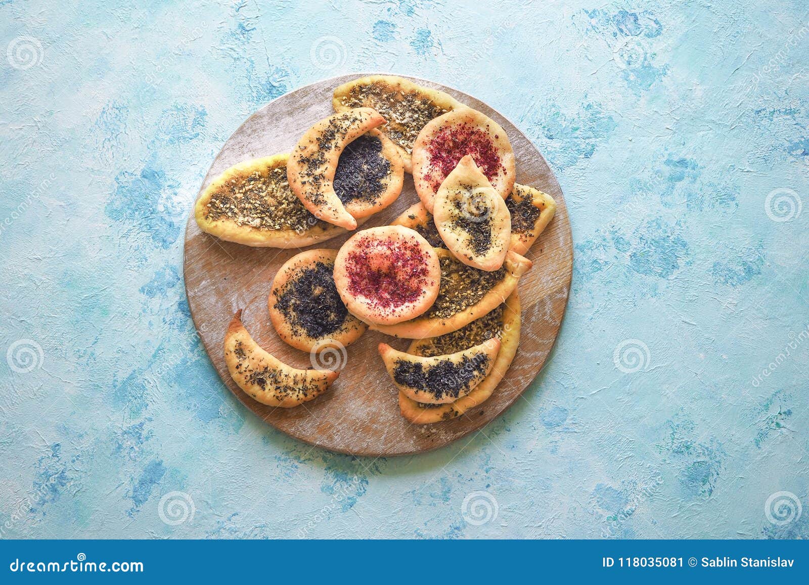 Arabic Kitchen Baking. Scones with Herbs Spices on the Blue Table Stock ...