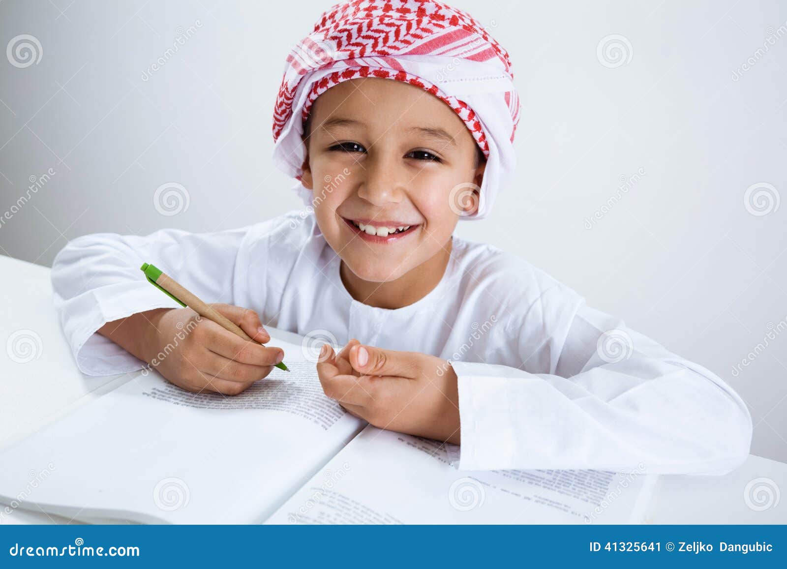 Arabic Little Boy Doing Homework Stock Image - Image of clothes, ethnic ...
