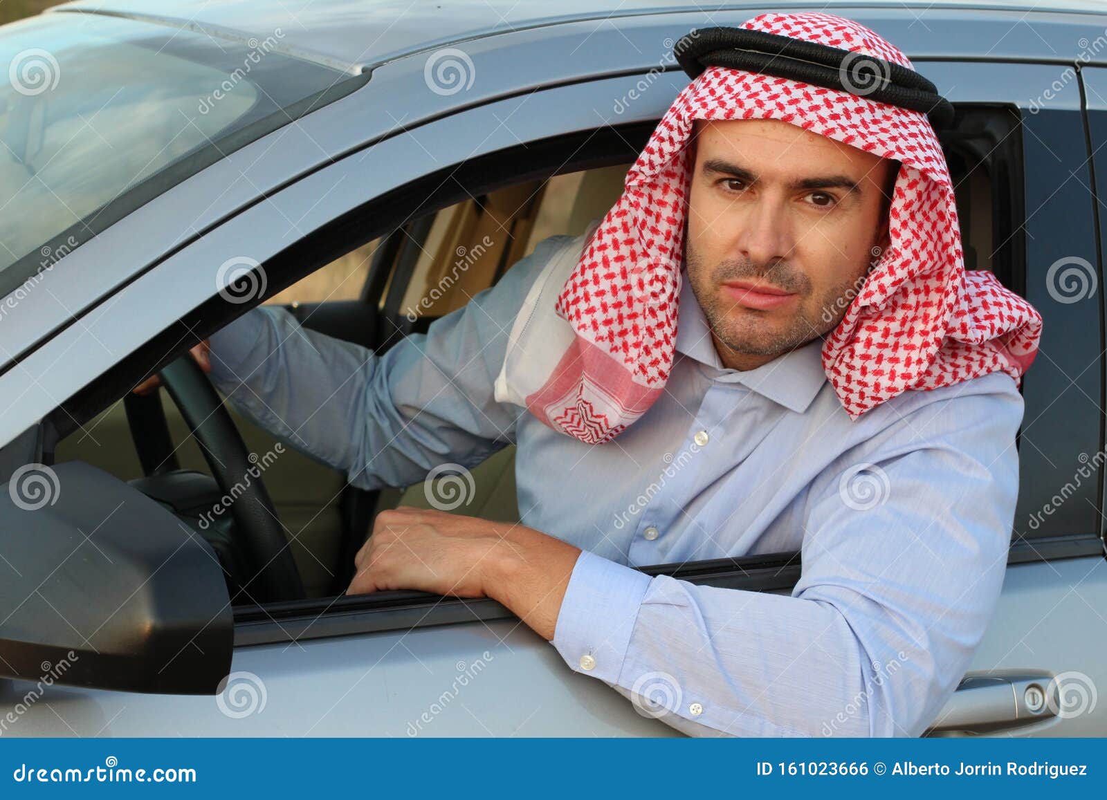 Arabic man driving a car stock photo. Image of driver - 161023666