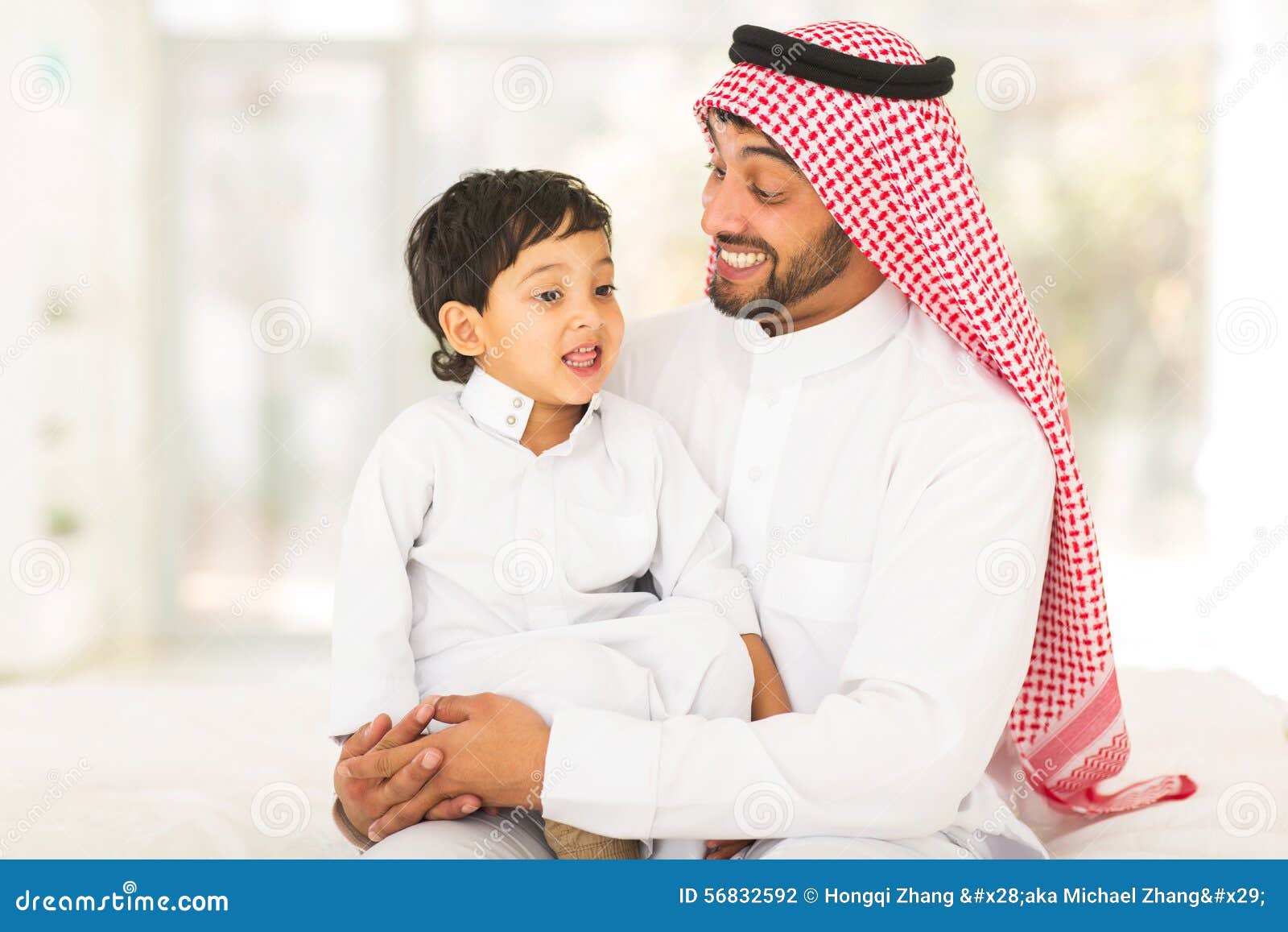 Arabic man talking son stock photo. Image of happy, head - 56832592