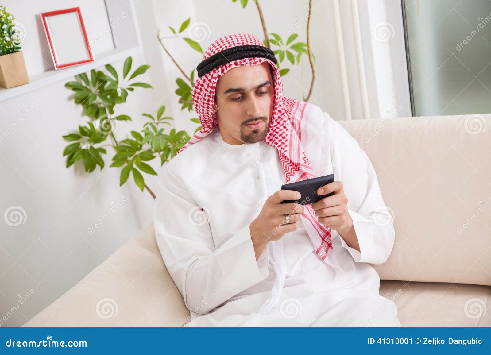 Arabic Man Using Smartphone Stock Image - Image of middle, digital ...