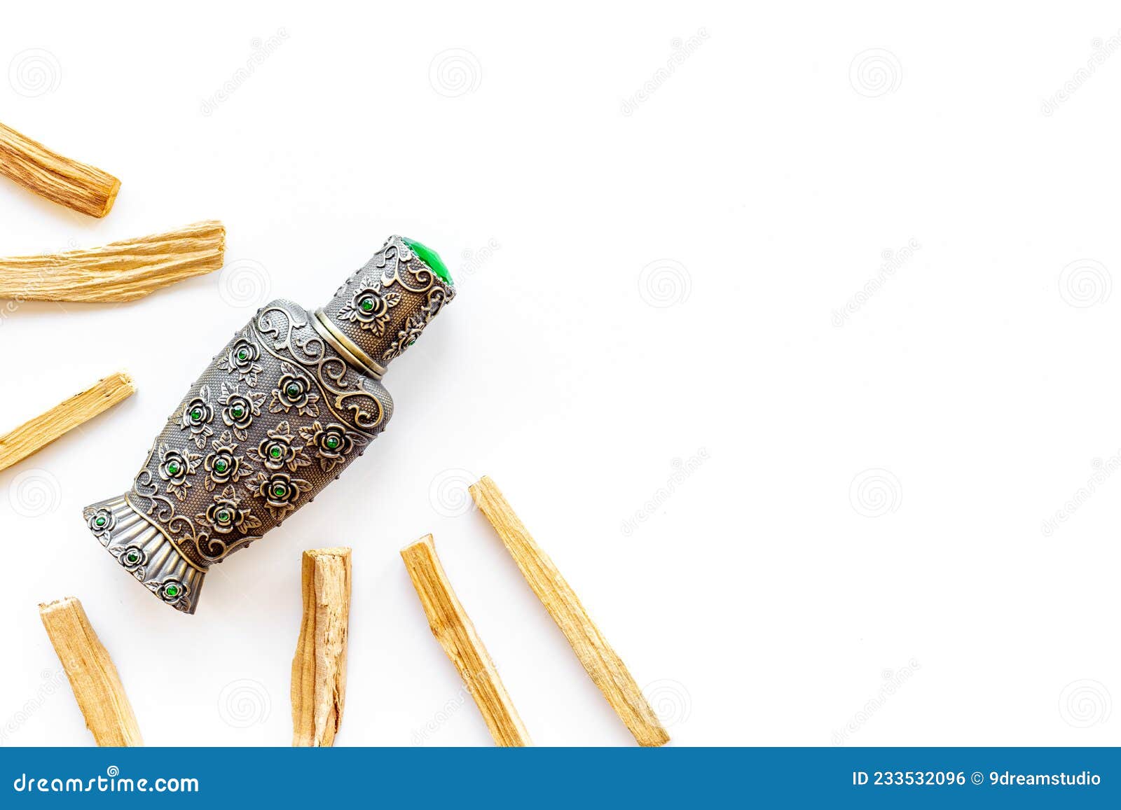 Arabic Oud Oil Perfume in Silver Bottle with Crystals and Sticks of ...