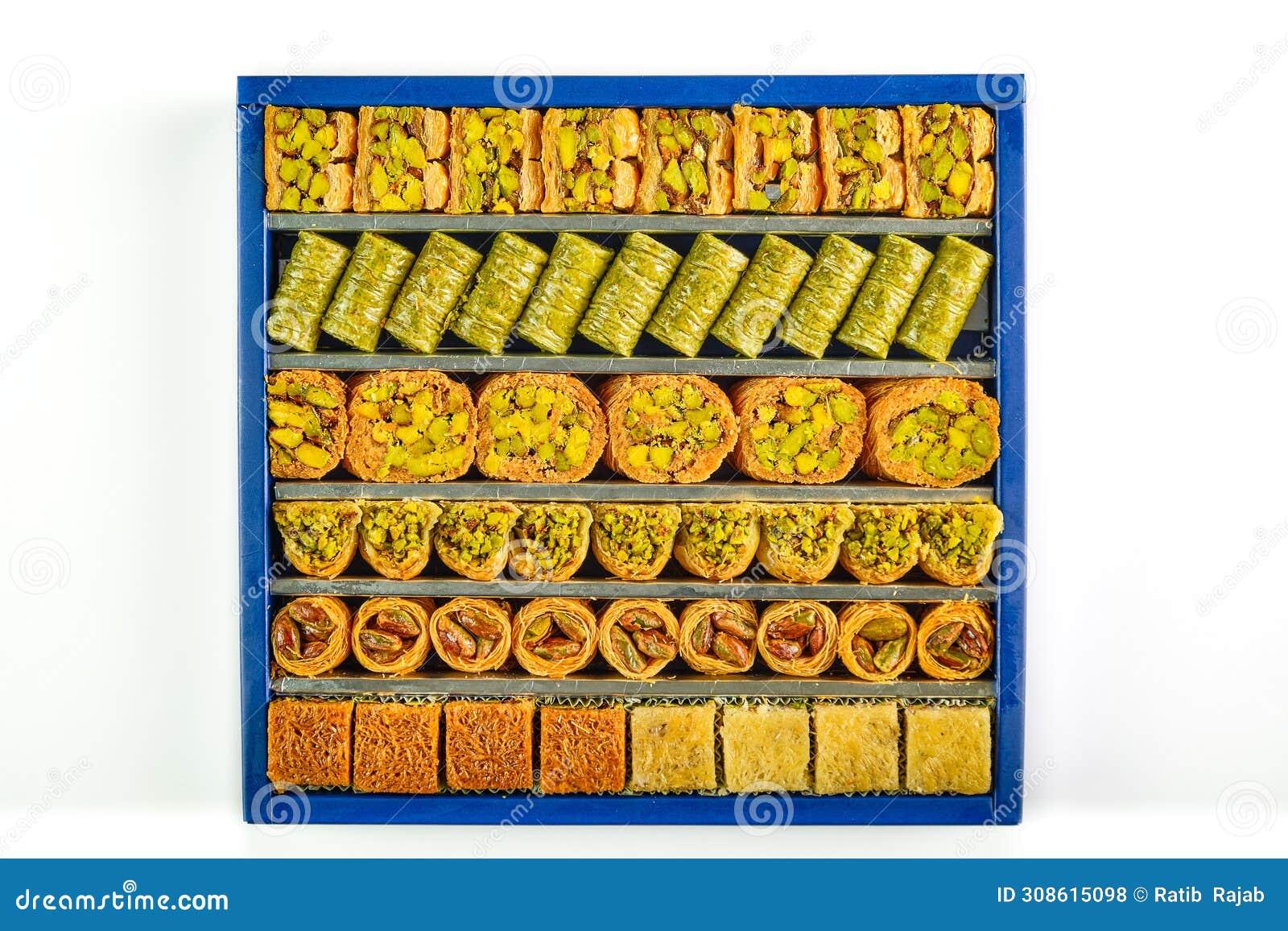 A Box of Assorted Arabic Sweets with Pistachios Stock Photo - Image of ...