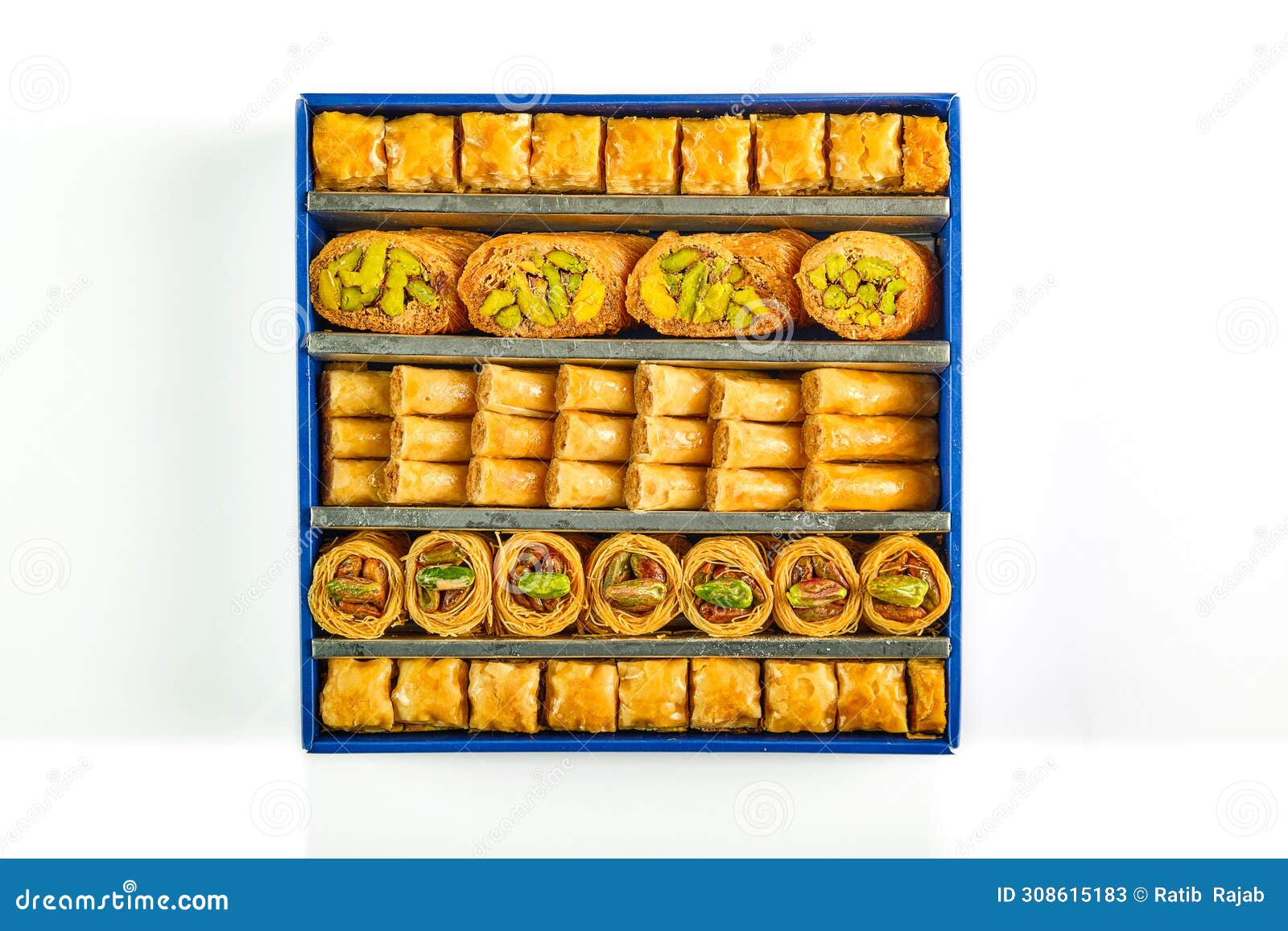 A Box of Assorted Arabic Sweets with Pistachios Stock Image - Image of ...