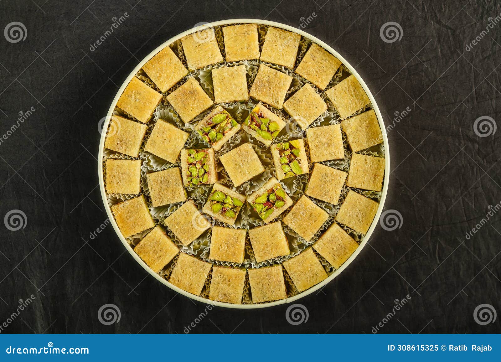 A Box of Assorted Arabic Sweets with Pistachios Stock Image - Image of ...