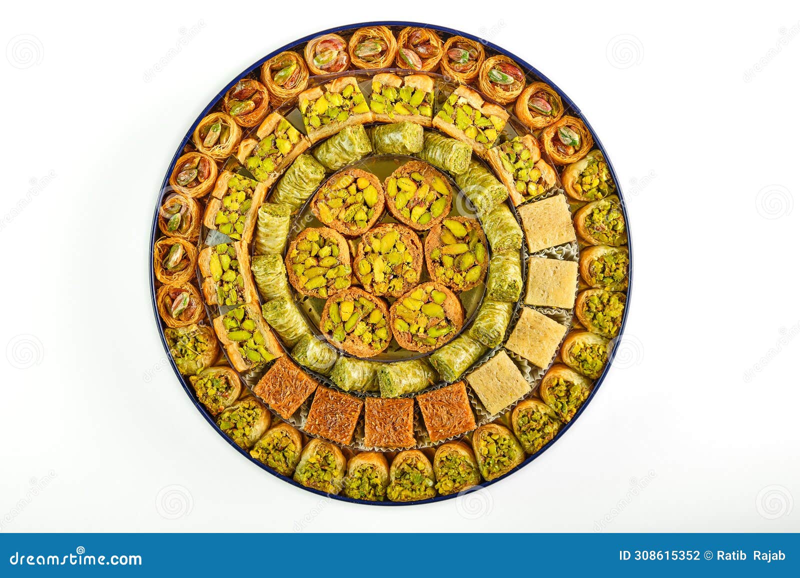 A Box of Assorted Arabic Sweets with Pistachios Stock Photo - Image of ...