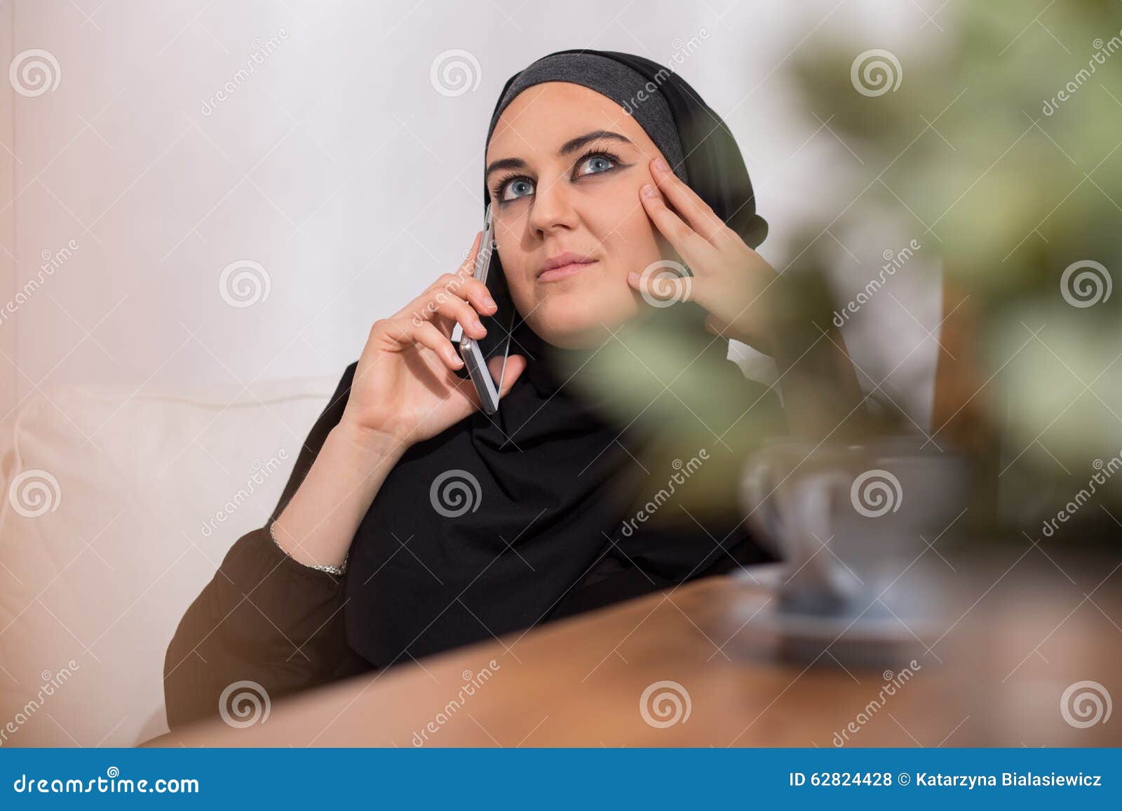 Arabic woman with a phone stock photo. Image of happy - 62824428