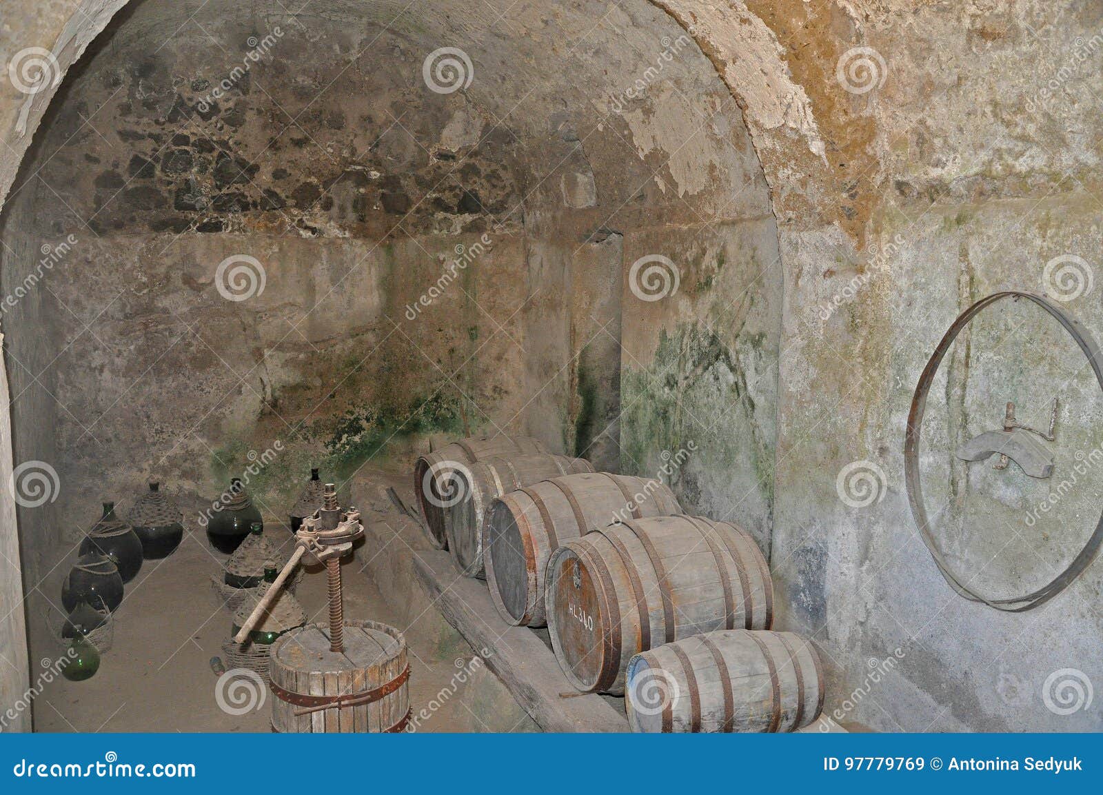 The Aragonese Castle Cellar with Old Barrels and Bottles Stock Image ...