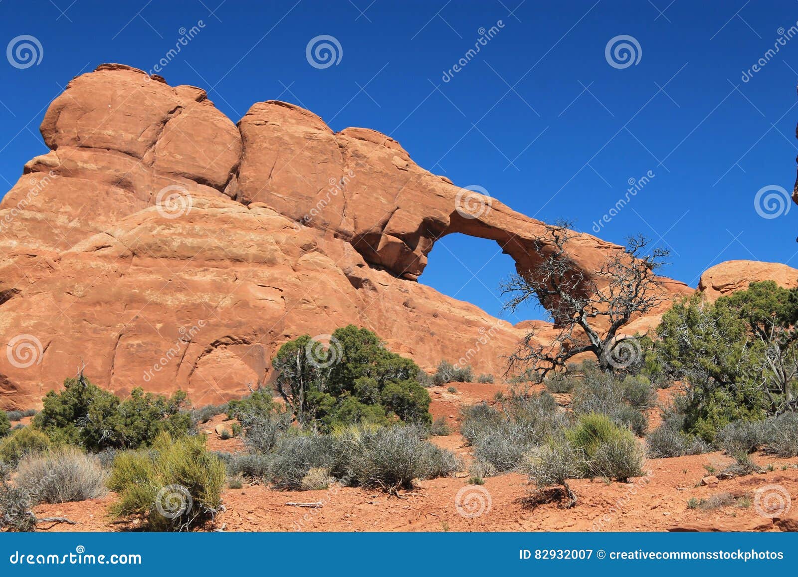 Arc Rock Formation Under Blue Clouds During Daytime Picture. Image ...