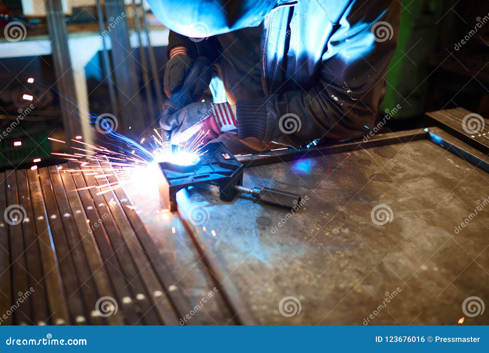 Arc Welding in Dark Workshop Stock Photo - Image of person, industry ...