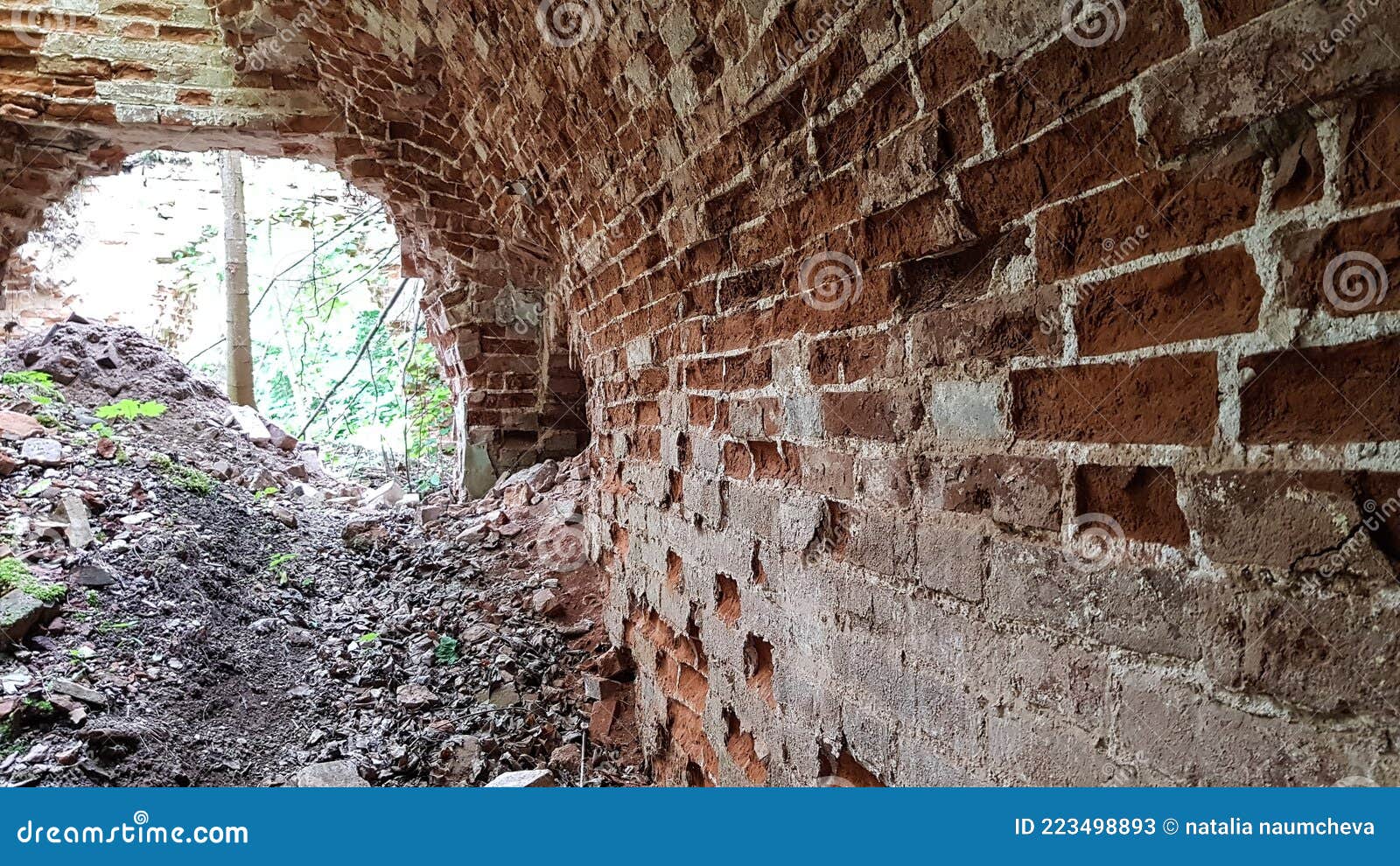An Arch in Ancient Ruins . the Old Red Brick Building is Falling Apart ...