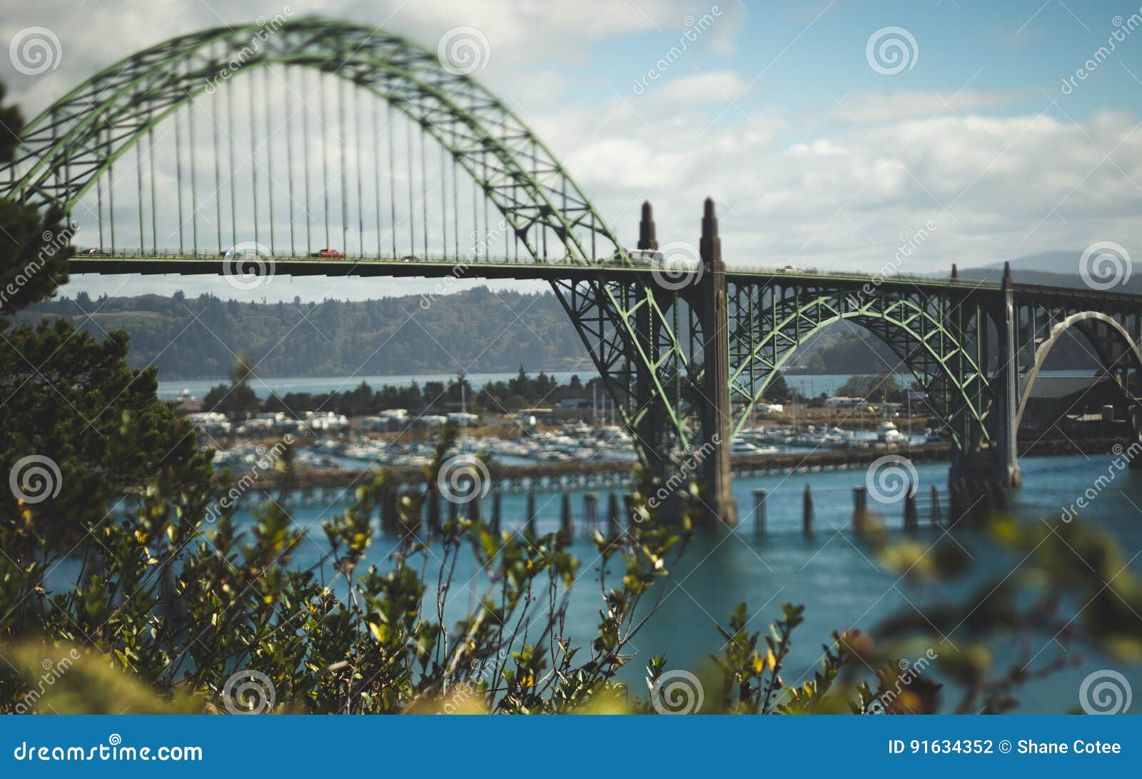 Arch Bridge Over River stock photo. Image of boats, nature - 91634352
