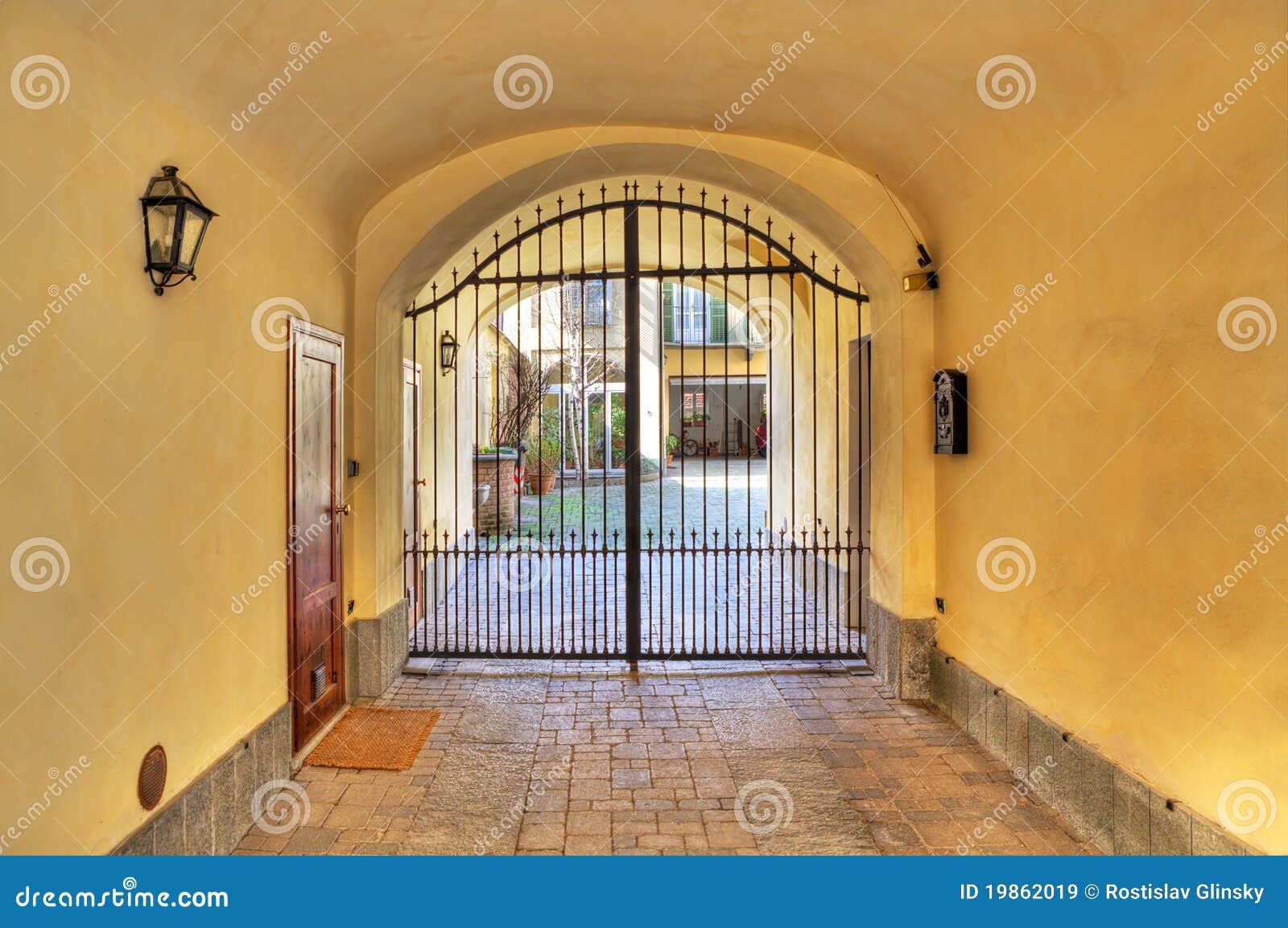 Arch and courtyard. stock image. Image of construction - 19862019
