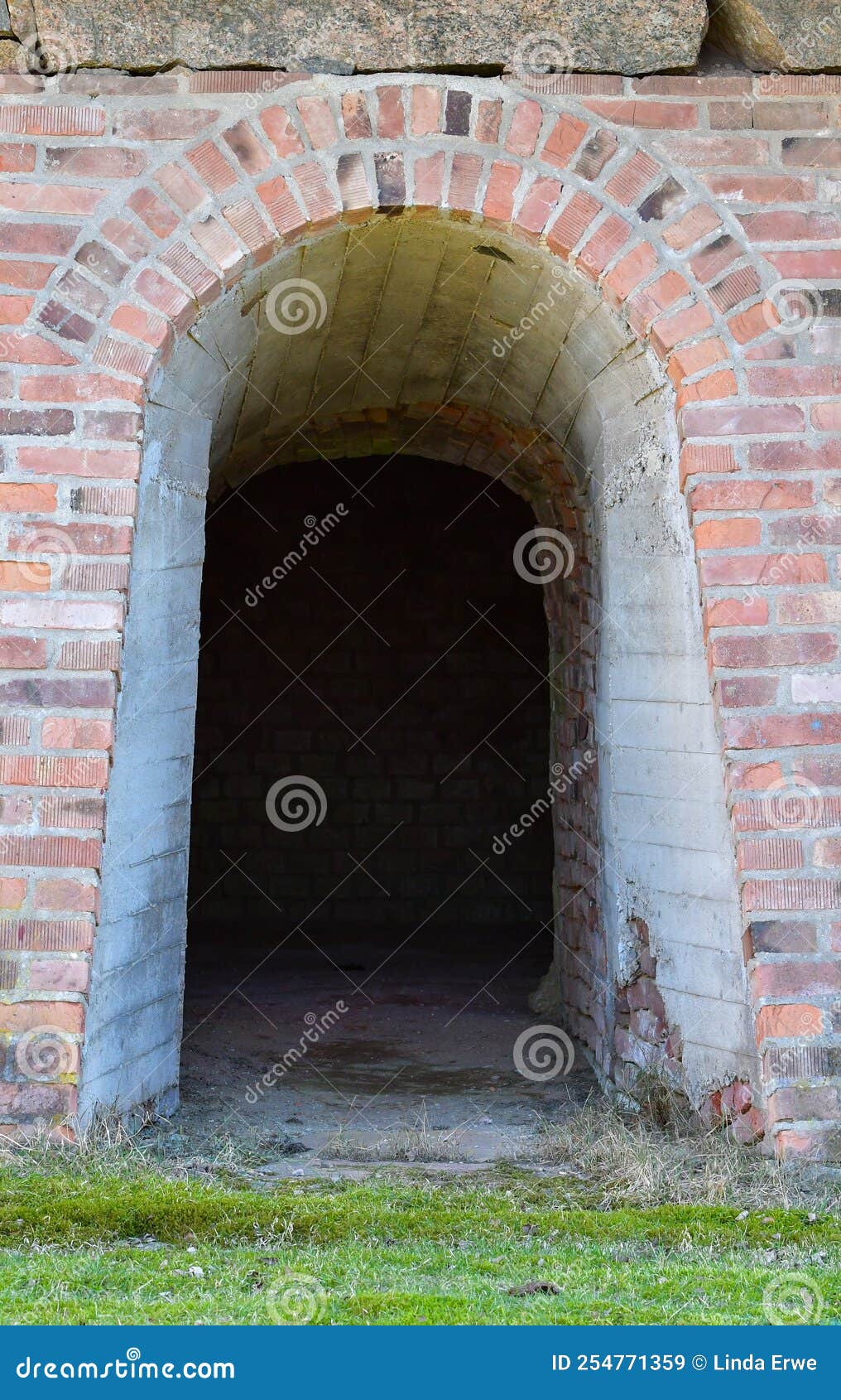 An arch made of red bricks stock image. Image of design - 254771359