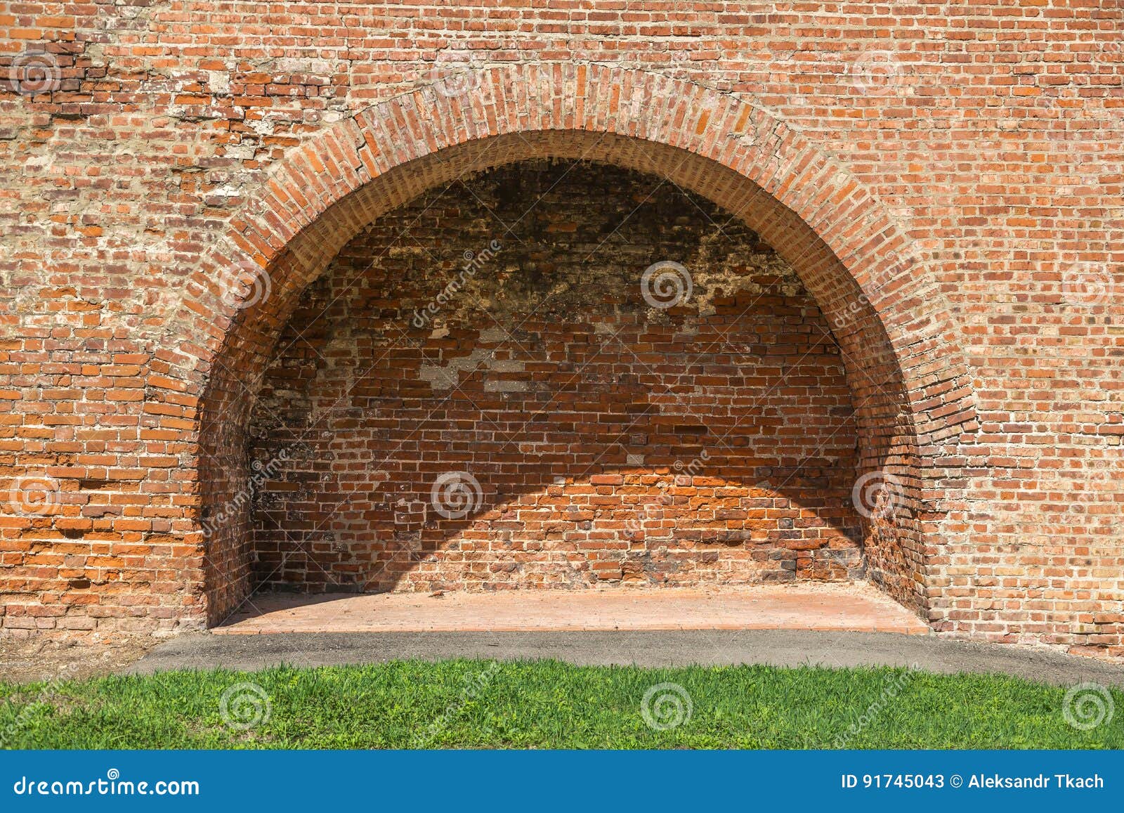 Arch, Bricked Up In The Old Brick Wall. On The Wall And The Arch Shines ...
