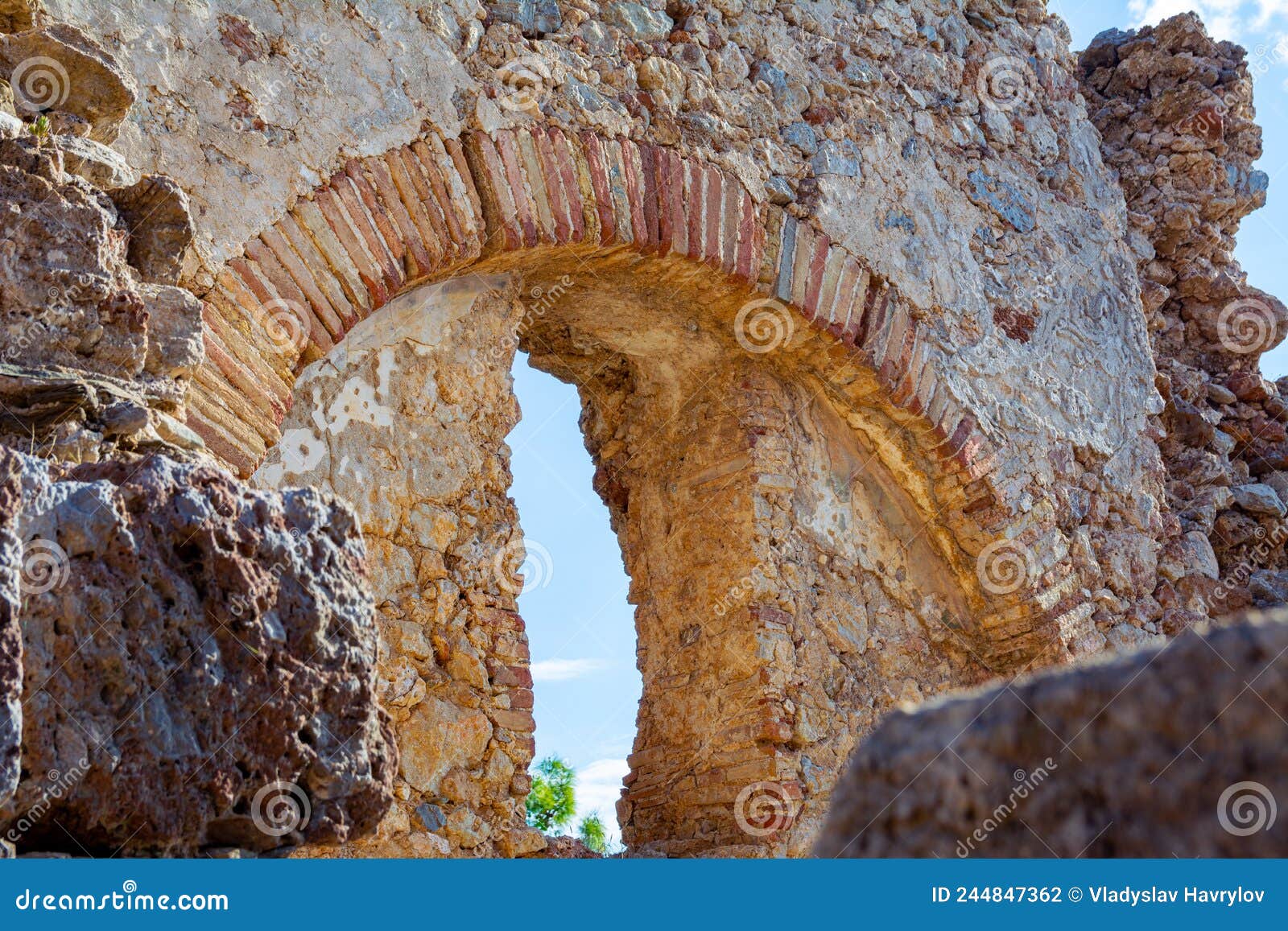 Arch and Opening in an Antique Stone Wall Stock Photo - Image of arch ...