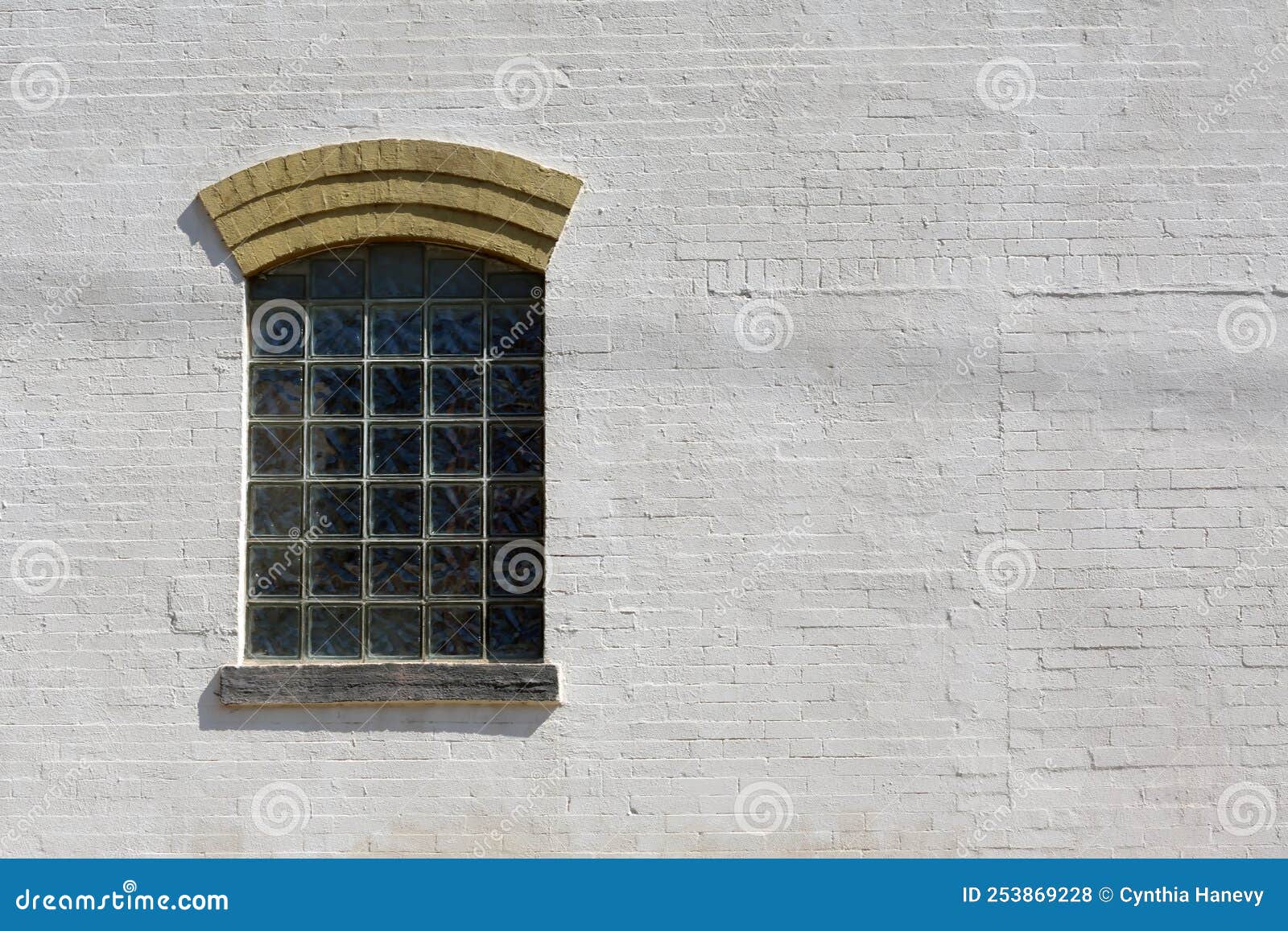 Arch Over Window on a White Brick Wall. Stock Photo - Image of gold ...