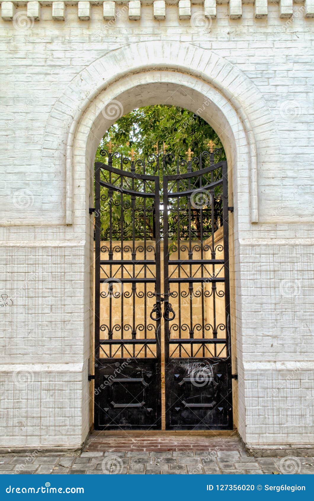 Arch Pass in an Ancient Brick Wall. Stock Photo - Image of cobblestone ...