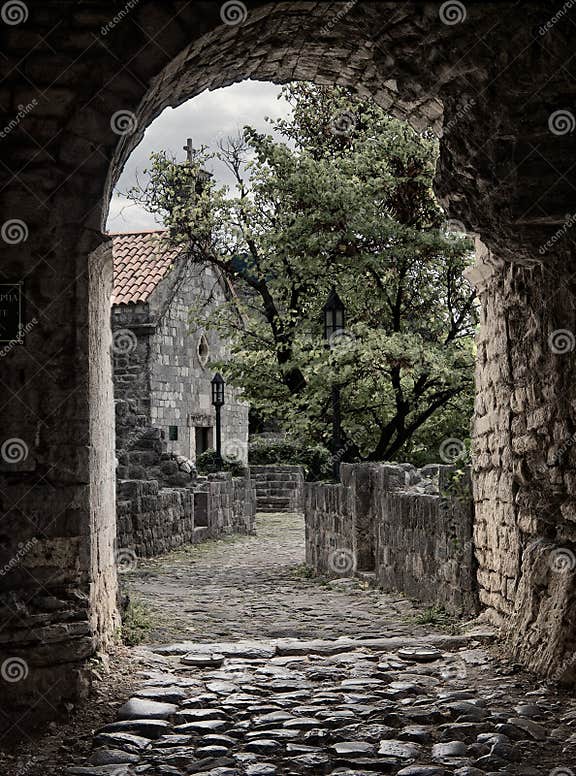 Arch pathway in old town stock photo. Image of historic - 16815596