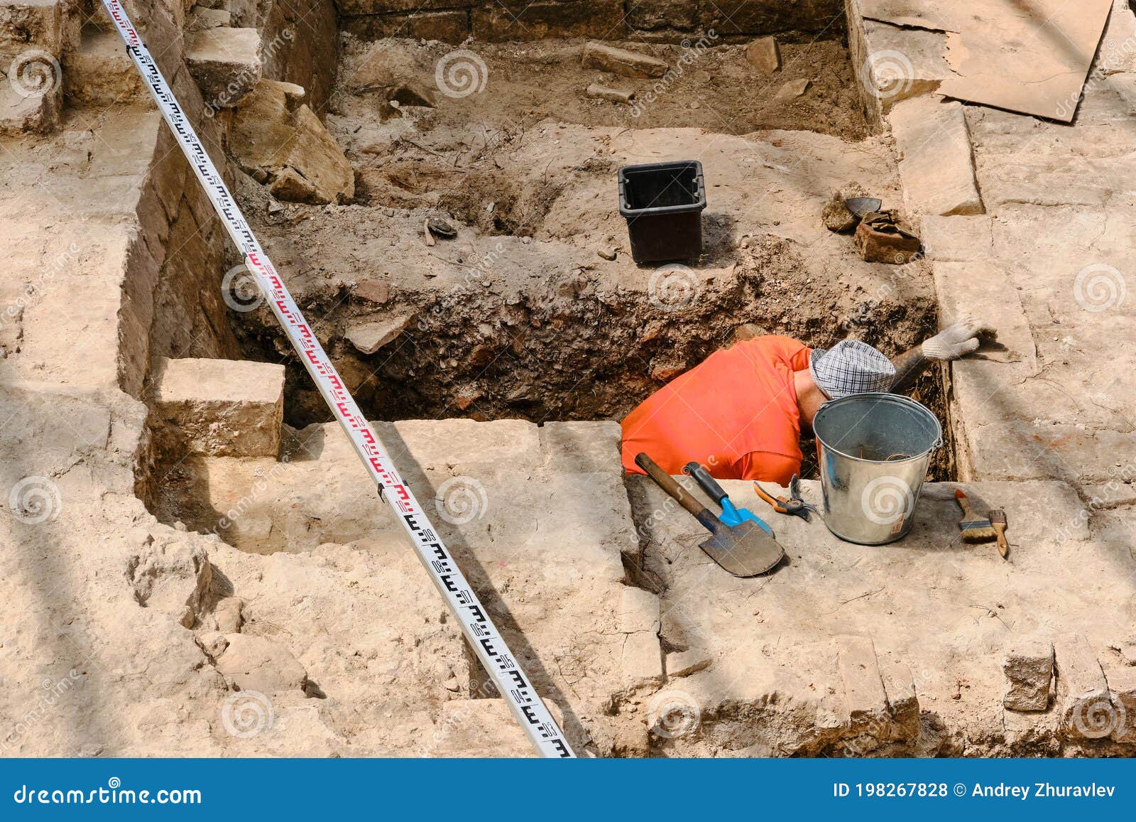 An Archaeologist is Excavating an Ancient Building. Archaeological Work ...