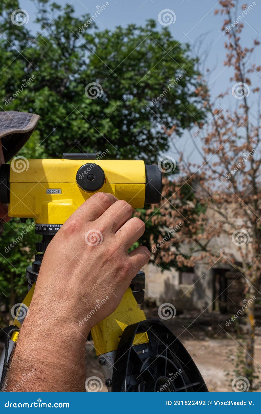 Archaeologist Using a Tedolite in an Archaeological Excavation Stock ...