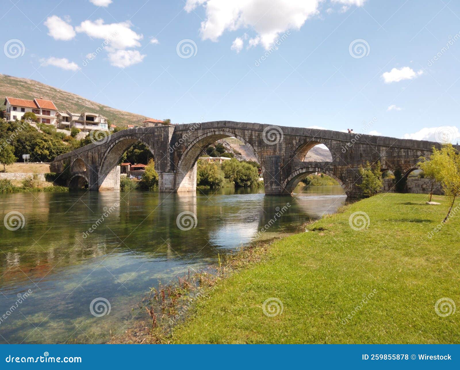 Arched Old Stone Bridge Over the River Stock Photo - Image of outdoors ...