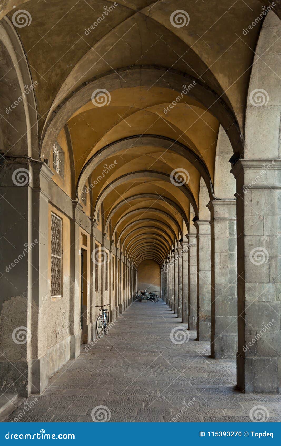 An arched passageway stock photo. Image of city, lucca - 115393270