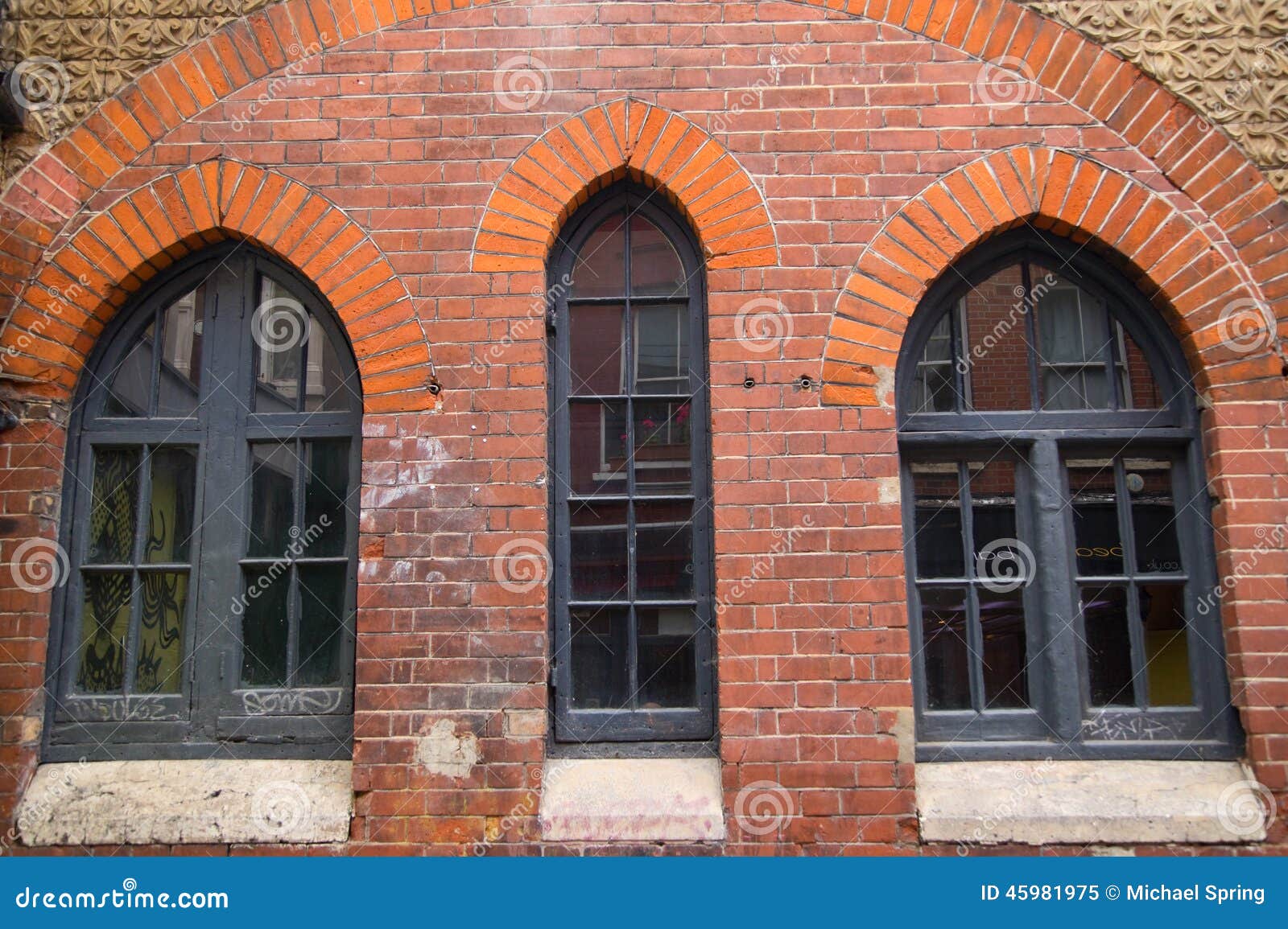 Arched warehouse windows stock image. Image of industry - 45981975