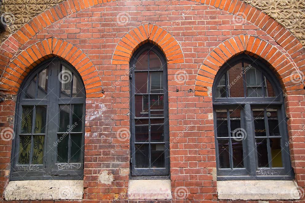 Arched warehouse windows stock image. Image of industry - 45981975