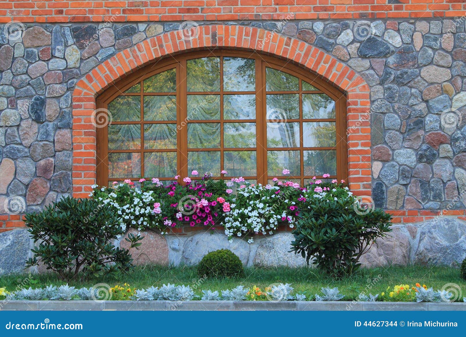 Arched window with flowers stock photo. Image of stone - 44627344