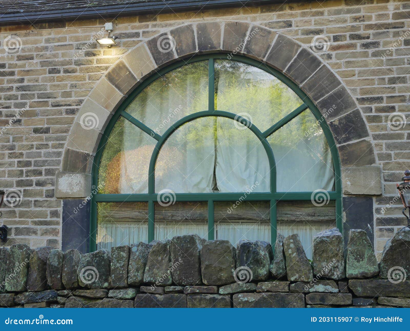 Arched Window in Stone Built House Stock Image - Image of infront, wall ...