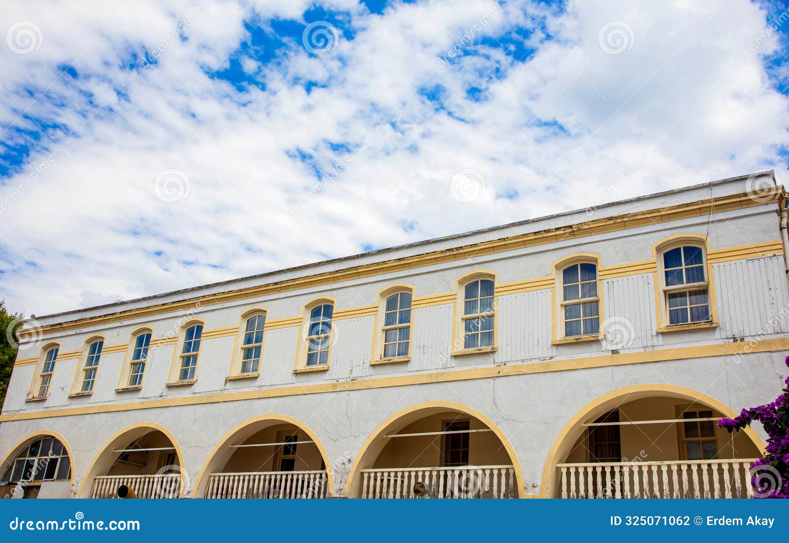 Arched Windowed Building and White Cloudy Blue Sky, Selective Focus ...