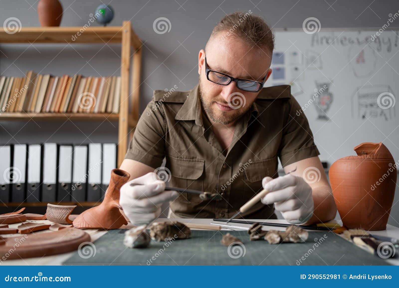 Archeologist Work in Office, Studying Newly Discovered Ancient ...