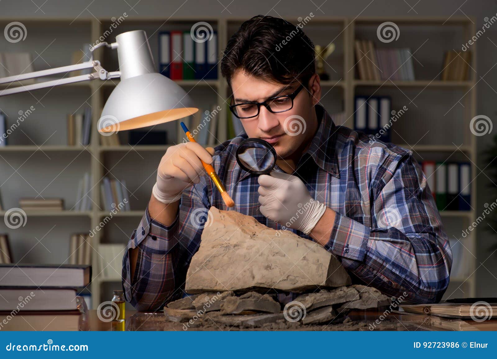 The Archeologist Working Late Night in Office Stock Photo - Image of ...