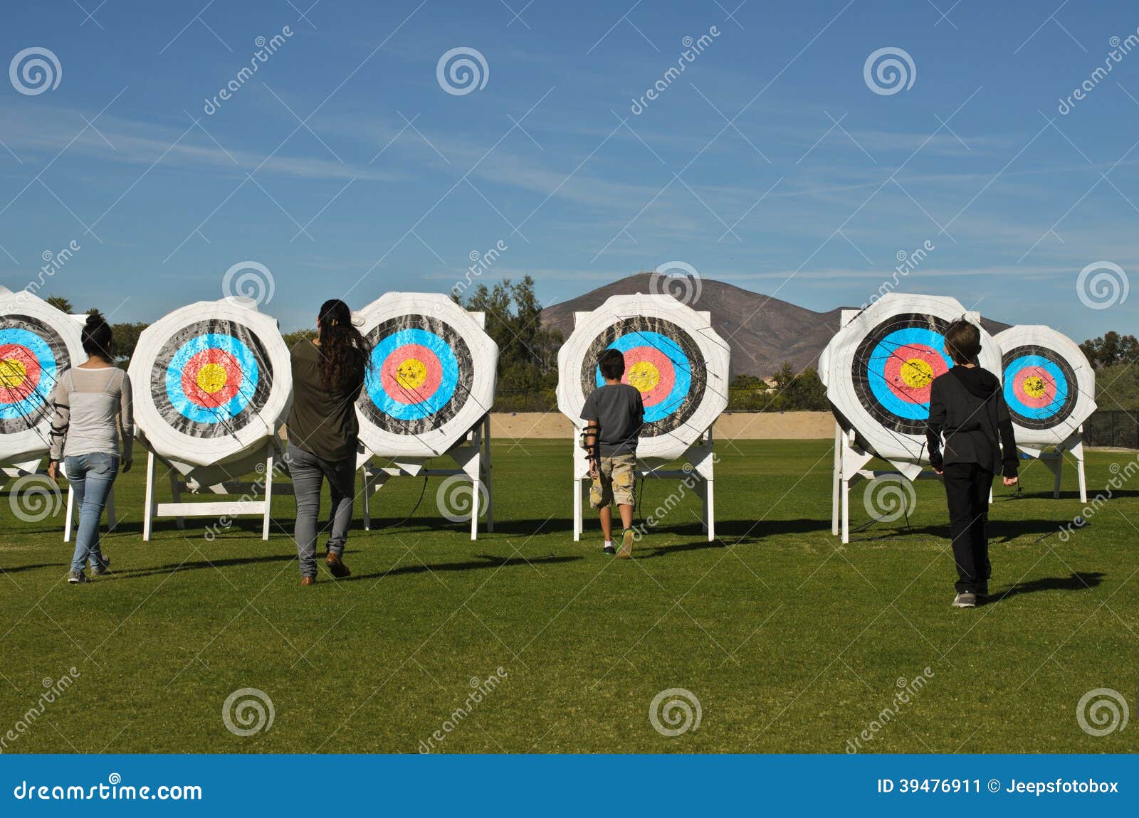 Archer Collecting Arrows from the Targets in the Field Editorial Photo ...