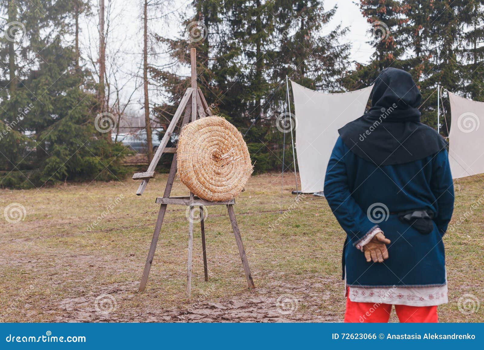 Archer Looks at Straw Target with Arrows in the Center Stock Photo ...