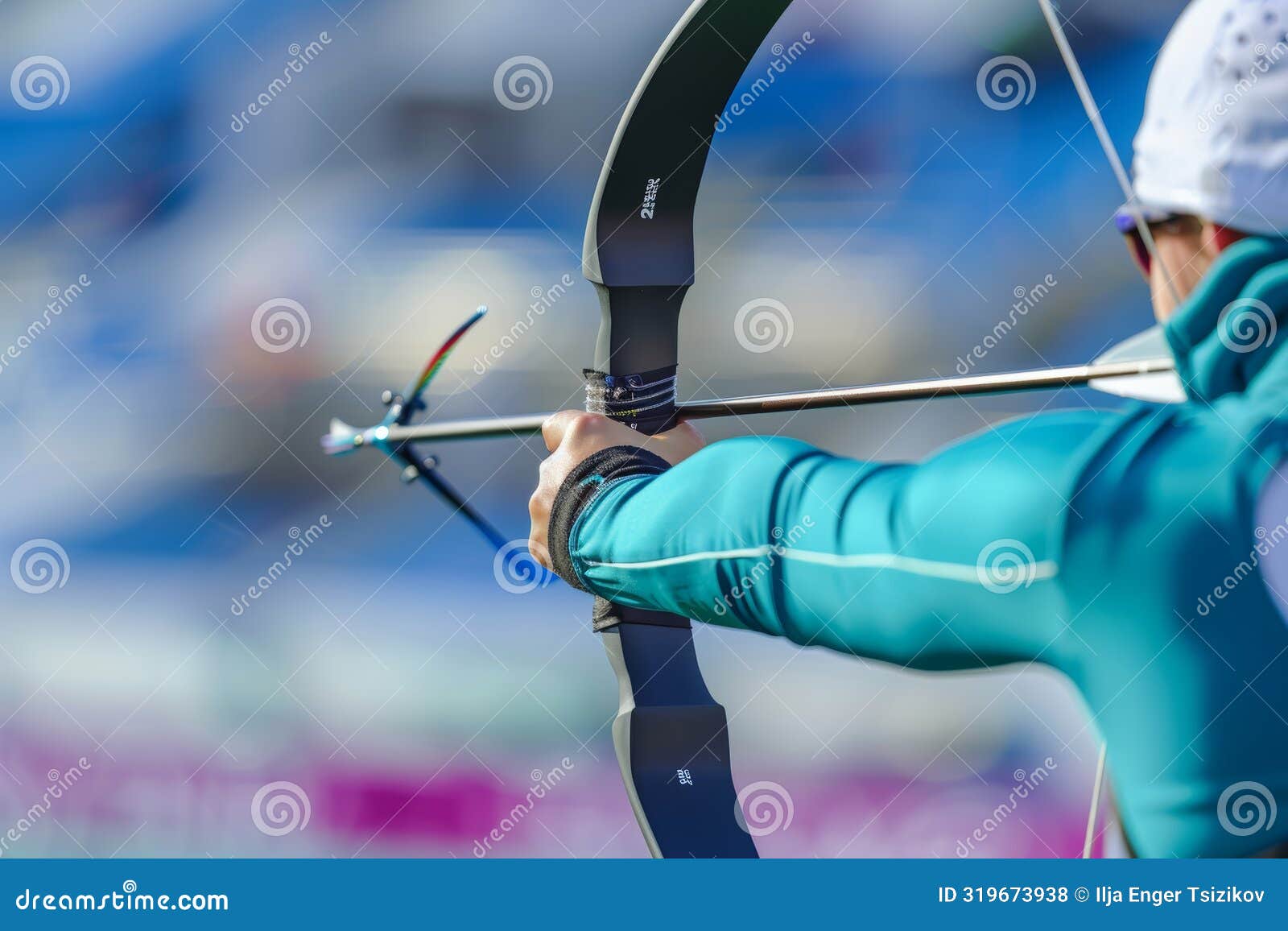 Archer S Focused Hand Drawing Bowstring, Showcasing Precision at the ...