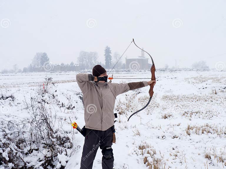 Archer in winter time stock photo. Image of archery, snow - 28818108
