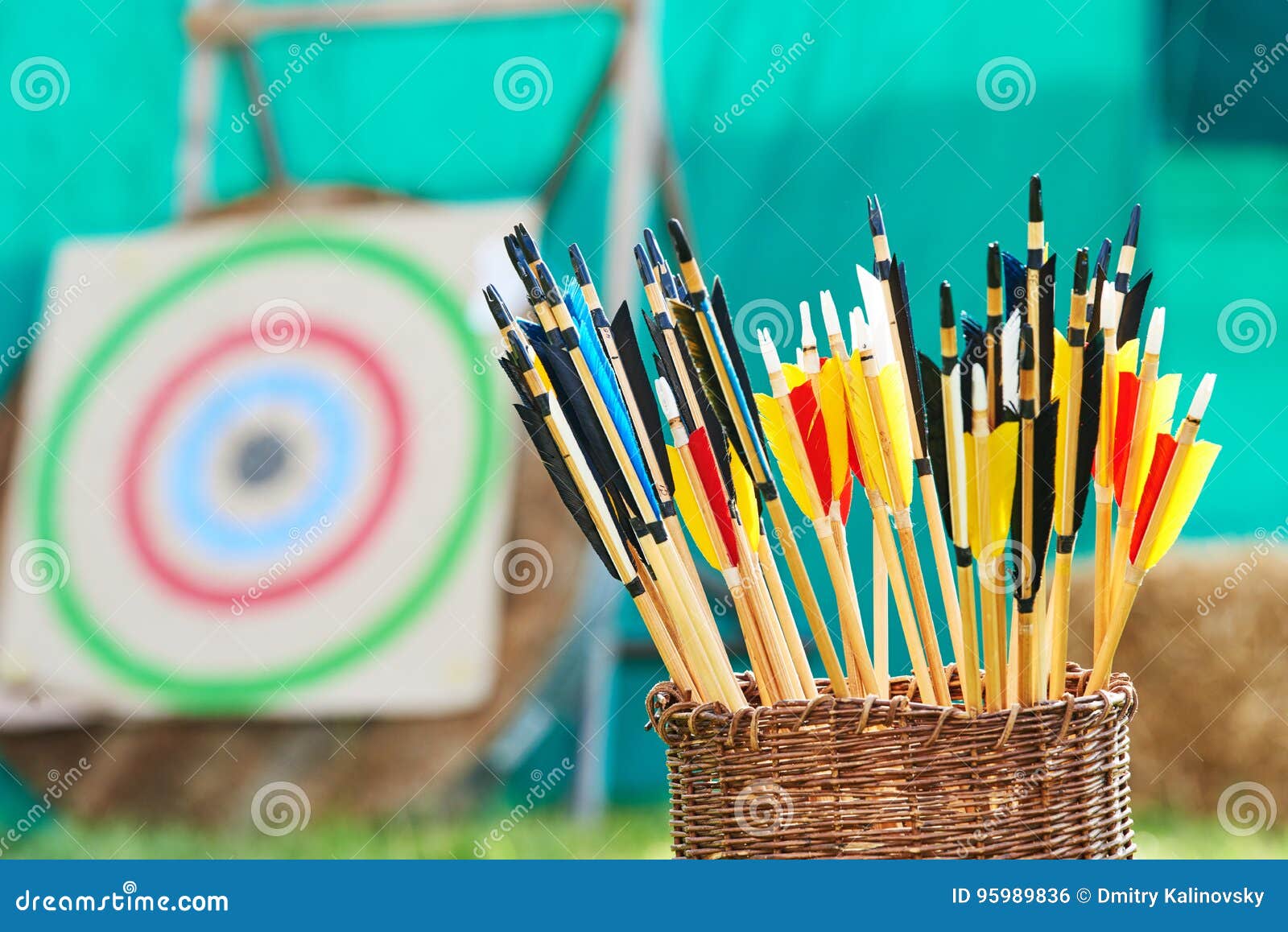 Archery Concept. Basket with Arrows in Front of Target. Stock Photo ...