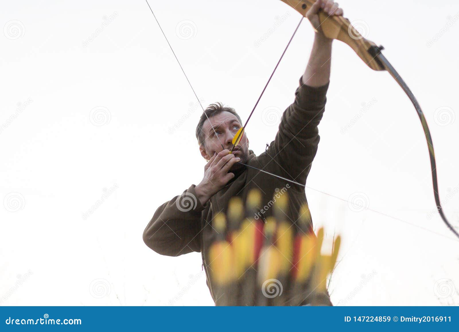 Archery. Man with a Bow. Cropped Image. Stock Image - Image of ancient ...