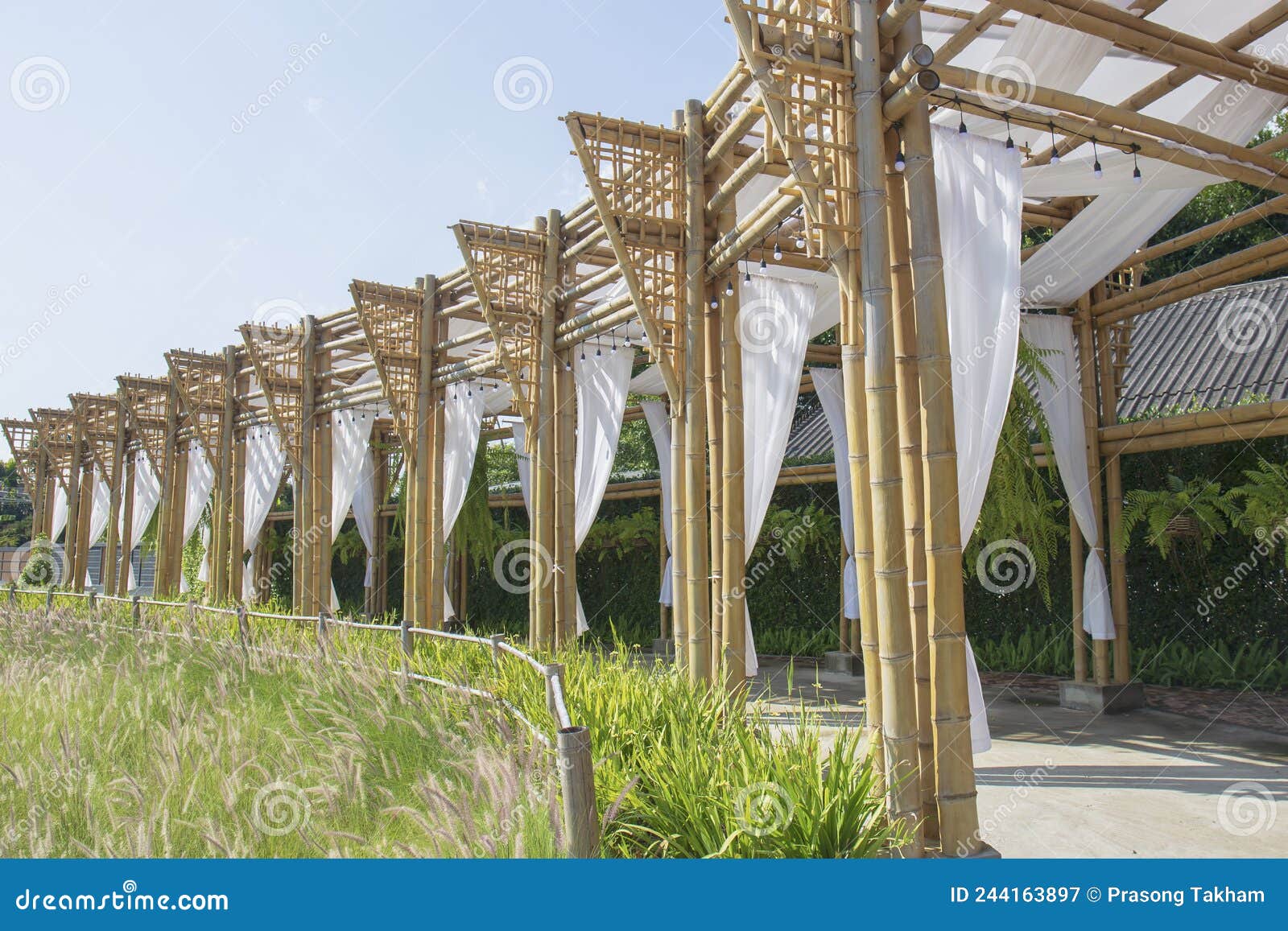 Arches Made of Bamboo Make a Walkway and Decorated with Beautiful White ...
