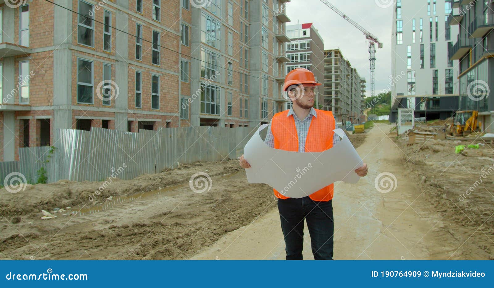 Architect or Builder Man Walking on the Construction Site and Analyzing ...
